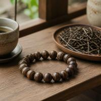 China Natural Aquilaria Wood Taoist Bracelet with Tiger Stripe Grain and Subtle Woody Fragrance for Meditation for sale