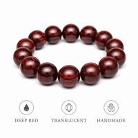 China Handmade Natural Dragon Blood Wood Taoist Bracelet with Translucent Glow and Hand-Polished Beads for sale