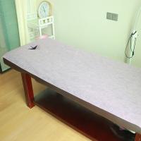 China Pp Spun Bond Waterproof Disposable Bed Sheet Roll With Cross Whole for sale