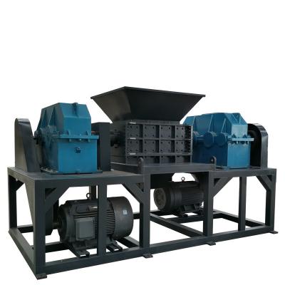 China Industrial Twin Shaft Plastic Shredder 7.5-220KW for PET Bottles Bags and Waste for sale