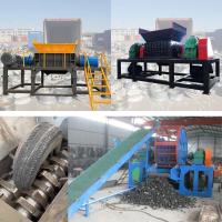 China Vertical Twin-Shaft Shredder 50-200mm Output for Waste Rubber Tires Recycling 37KW for sale