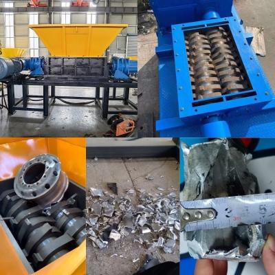 China Hummer Twin Shaft Metal Scrap Shredder Crusher 22-110kw for Iron Wire Recycling for sale