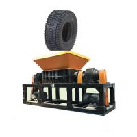China Double Shaft Tire Shredder 50-200mm Output Waste Rubber Recycling Machine 15-220kW for sale