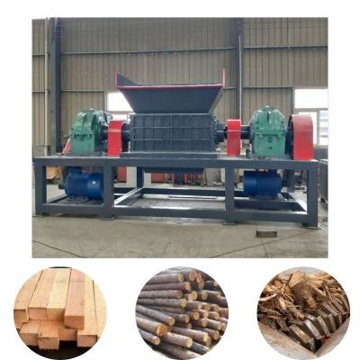 China Full Automatic Scrap Wood Pallet Shredder 7.5-220KW Twin Shaft Shredding Machine for Waste Wood Recycling for sale