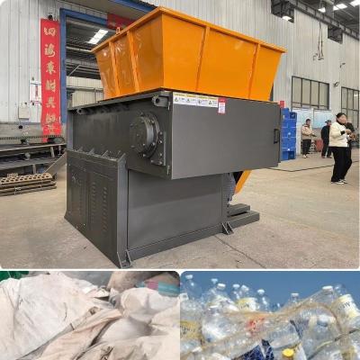 China Automatic Waste Plastic Bottle Recycle Single Shaft Shredder Machine 18.5-75KW 600-1500mm for sale