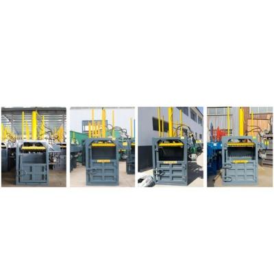 China Hydraulic Vertical Waste Paper Baler MCDL-20 20T Baling Press for Cardboard Carton for sale