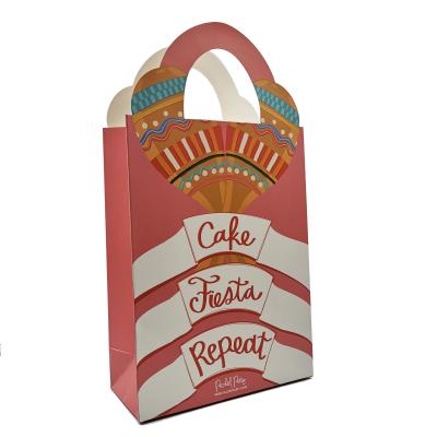 China Custom Printed Paper Gift Bags 350gsm CMYK Flexographic Christmas Shopping Bags for sale