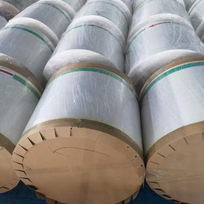 China Recycled Pulp Style Printed Parchment Paper For Food Craft Paper Packaging Material for sale
