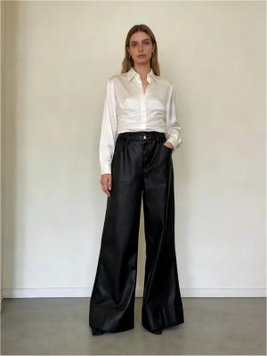 China Minimalist faux leather wide leg trousers with a sleek linear silhouette for modern understated style for sale