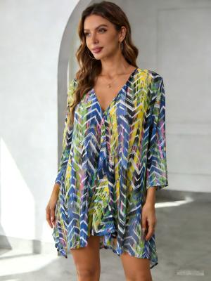 China Bohemian Knit Top with Deep V Neckline Flowy A-Line Silhouette and Asymmetric Curved Hem for sale