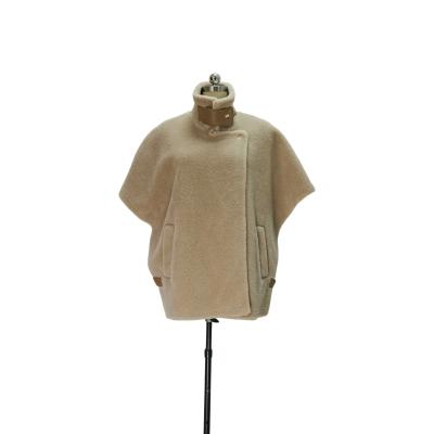 China Beige ultra-soft fleece poncho coat with brown leather buckle detailing for sale