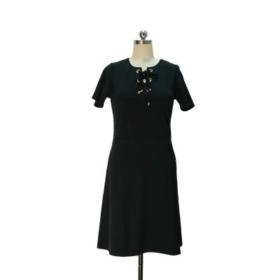 China Short-sleeve black A-line dress with eyelet lace-up detail soft smooth fabric and loose flowy skirt for sale