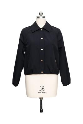 China Black Cropped Jacket with Gold Snap Front Raglan Sleeves and Snap Closure Side Pockets Collared Jacket for sale