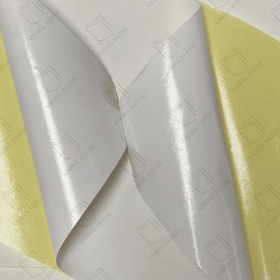 China 70*100cm Self Adhesive Sticker Paper with High Glossy Yellow Glassine Paper Supplier for sale