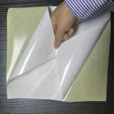 China 150-250g White Glossy Self-Adhesive Sticker Paper For Shipping Instruction Label Application for sale