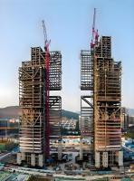 China High Rise Prefabricated Steel Frame Houses Prefab Commercial Metal Buildings Seismic for sale