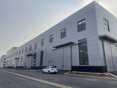 China Green Prefab Steel Structure Wind Resistant Modular Steel Frame Degree 8 Fortification for sale