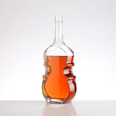 China Collar Material Aluminum Plastic PP Woman Body Shape Unique 200ml Liquor Glass Bottle for sale