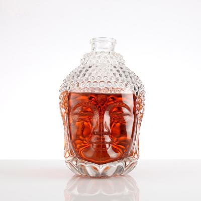 China Super Flint Glass Body Material Nordic Red Glass Gun Bottle for Whiskey Vodka Sale for sale