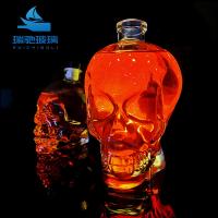China 380ml 500ml 700ml 1000ml Skull Shape Glass Liquor Bottle with Cork and Transparent Body for sale