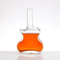 China 750ml Guitar Shaped Glass Bottles for Party Bar Super Flint Glass Vodka Wine Bottles for sale