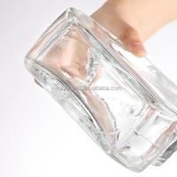 China 750ml Guitar Shaped Glass Bottles for Party Bar Super Flint Glass Vodka Wine Bottles for sale