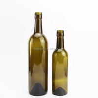 China Surface Handling Hot Stamping Customized Logo 500ml 750ml Wine Liquor Glass Bottle for sale