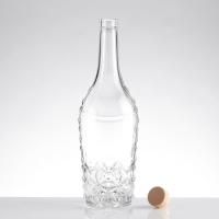China Wooden Corks 750ml Glass Bottle for Vodka Latest Delicate Emboss Design and Hot Stamping for sale