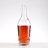 China Wooden Corks 750ml Glass Bottle for Vodka Latest Delicate Emboss Design and Hot Stamping for sale
