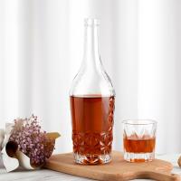 China Wooden Corks 750ml Glass Bottle for Vodka Latest Delicate Emboss Design and Hot Stamping for sale