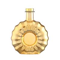 China Customized Sealing Type Elegant 750ml Stereoscopic Engrave Glass Bottle for Wedding for sale