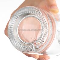 China Transparent Colored Glass Wine Bottles 500ml 700ml 750ml Perfect for Liquor Packaging for sale