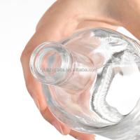 China Transparent Colored Glass Wine Bottles 500ml 700ml 750ml Perfect for Liquor Packaging for sale