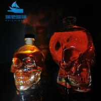 China Customize Skull Shape Hot Stamping Screen Printing 750ml Glass Liquor Bottle with Lid for sale