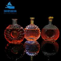 China 500ml Soft Drink Bottle Glass Water Liquor Bottle with Cap Seal in Super Flint Glass for sale