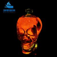 China Customize Skull Shape Hot Stamping Screen Printing 750ml Glass Liquor Bottle with Lid for sale