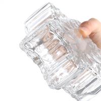 China Girls' Super Flint Glass Star Shaped Liquor Bottle with Aluminum Plastic PP Collar for sale