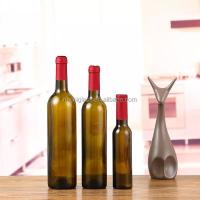 China Industrial Beverage Glass Bottle 500ml 700ml with Cap Super Flint Glass Body Material for sale