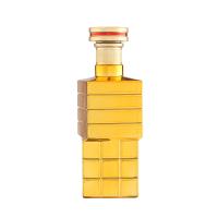 China Electroplated Yellow Glass Vodka Tequila Bottle 500ml with Custom-made Sealing Type for sale