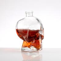 China Newest Industrial 500ml Super Flint Glass Skull Vodka Bottle with Sealed Aluminium Cap for sale