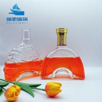 China Customized Hot Stamping 750 ml Liquor Unique Shaped Wine Glass Bottle with Cap for sale