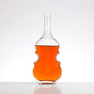 China Aluminum Plastic PP Collar Material Glass Bottle for Super Flint Shaped Gin Vodka Whiskey for sale