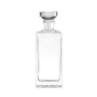 China Hot Stamping Surface Handling Customize 700ml Square Shape Clear Vodka Glass Bottle for sale