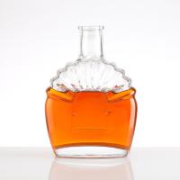 China Custom Emboss Glass Fashion Vodka Glass Bottles at with Hot Stamping Surface Handling for sale