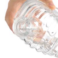 China Custom Emboss Glass Fashion Vodka Glass Bottles at with Hot Stamping Surface Handling for sale