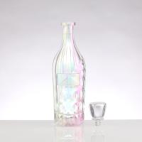 China Customized Hot Stamping 200ml 375ml 500ml 750ml Round Glass Liquor Bottle for sale