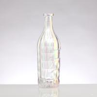 China Customized Hot Stamping 200ml 375ml 500ml 750ml Round Glass Liquor Bottle for sale