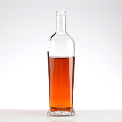 China Super Flint Glass Custom Logo Hot Stamping Vodka Brandy Liquor Beverage Wine Bottles with Cap for sale