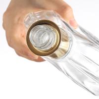 China Industrial Beverage 700ml Glass Vodka Whisky Bottle with Aluminum Plastic PP Collar for sale