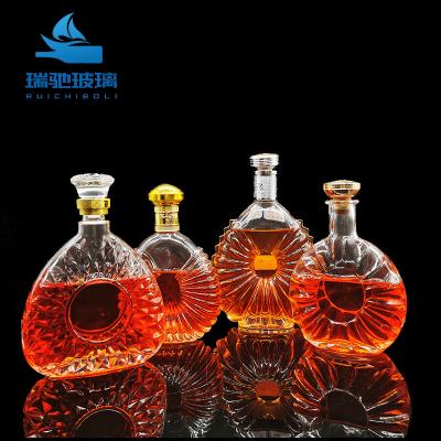 China Customized Logo Packaging 750ml Empty Glass Brandy Whisky Bottles with Cork Manufacture for sale